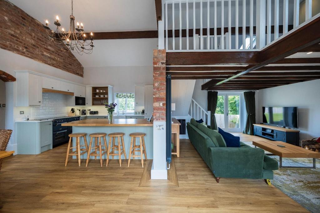 An immaculately presented link-detached cottage fully renovated to ...